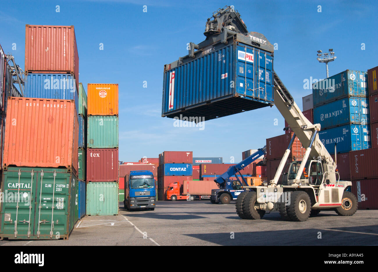 freight container is loaded onto truck in container terminal Stock ...