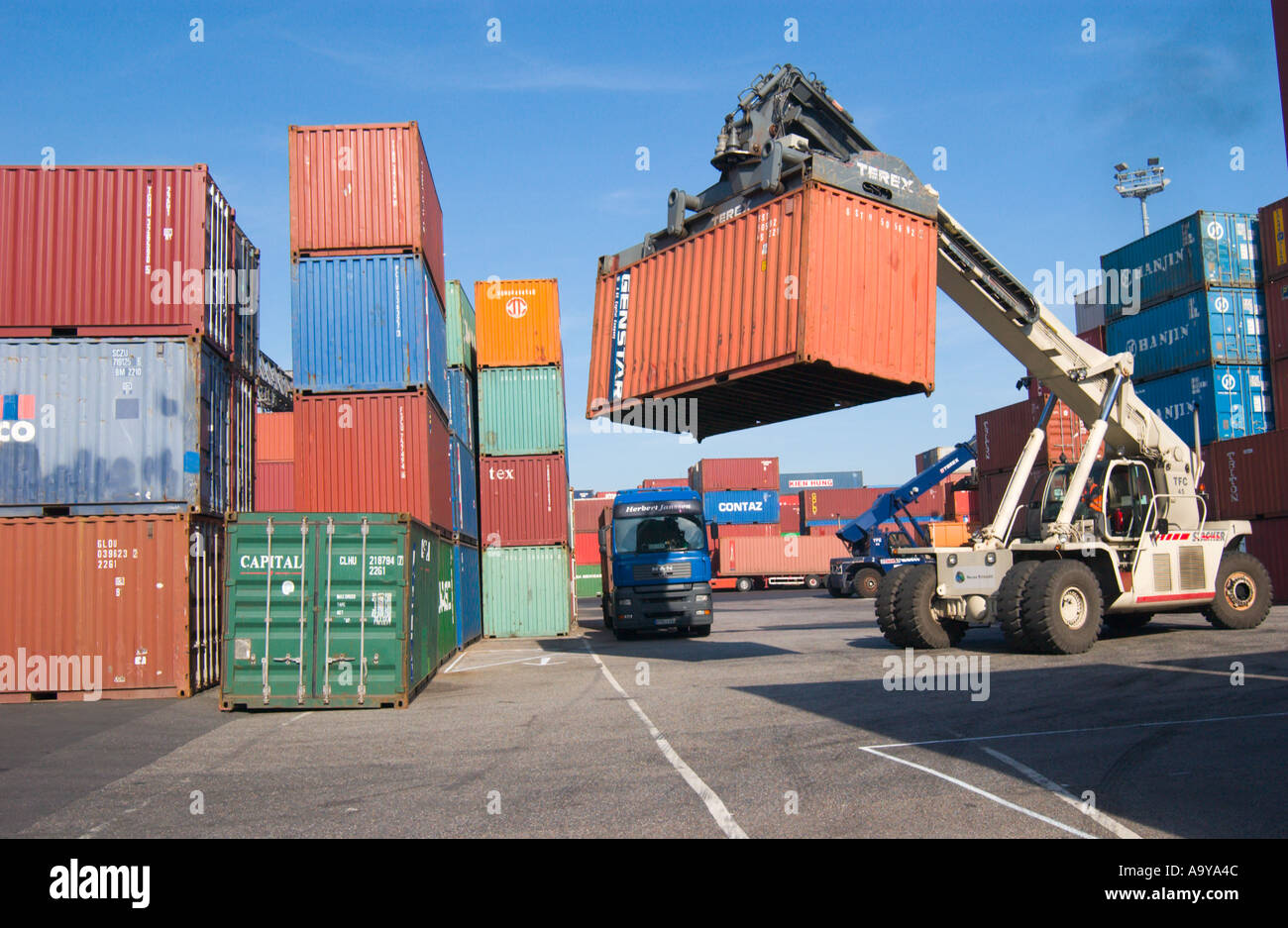 lifter loader moving freight container in container terminal Stock ...