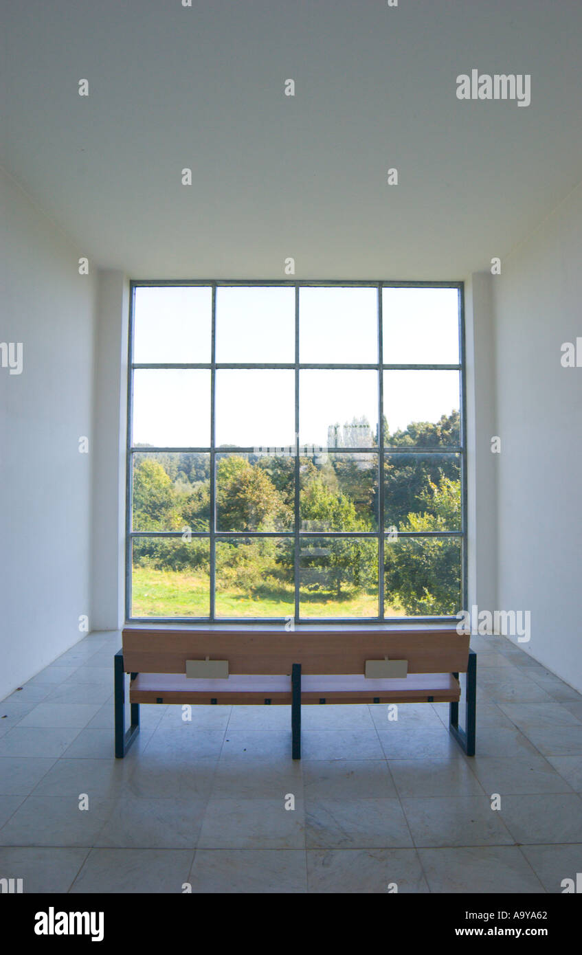wooden bench in empty room facing large window in Insel Hombroich Art ...