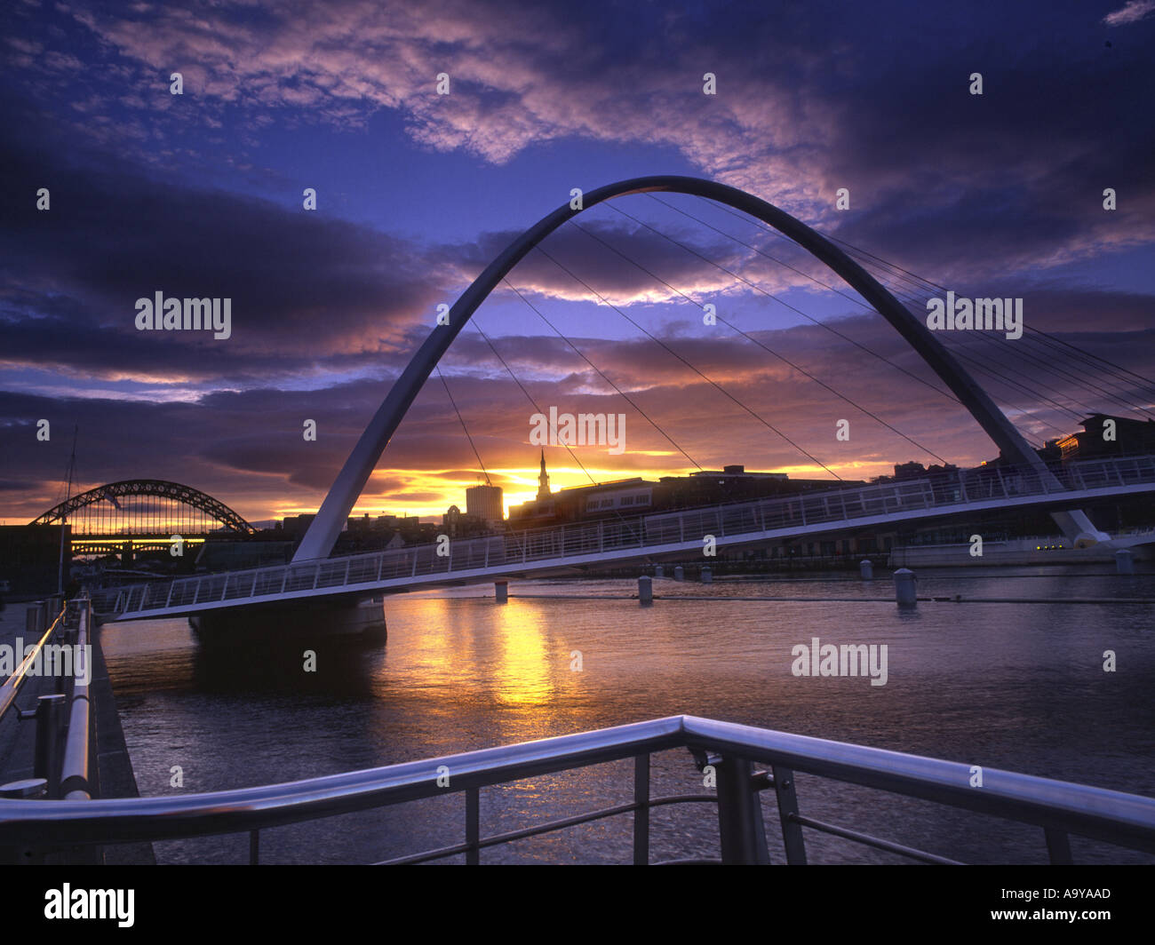 Tyne and millennium bridges at sunset hi-res stock photography and ...