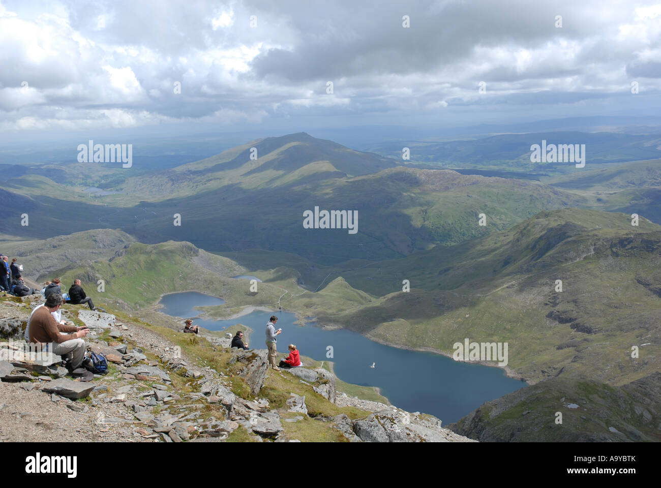 Walkers enjoying the view at summit of Mount Snowdon, Snowdonia, North ...