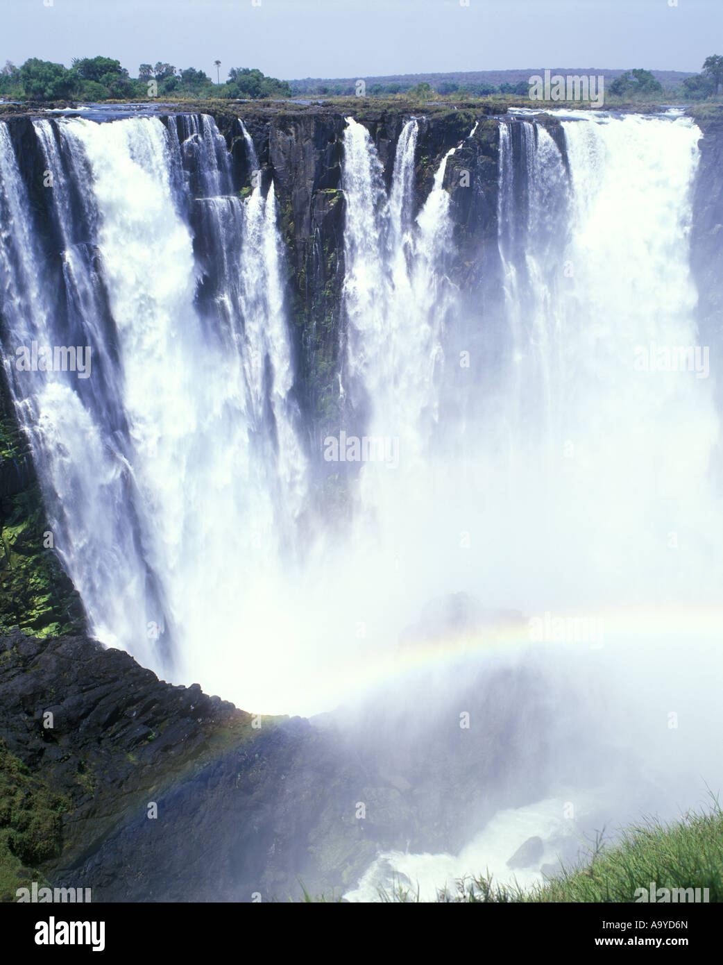 RAINBOW IN MIST MAIN WATERFALLS VICTORIA FALLS ZIMBABWE Stock Photo - Alamy