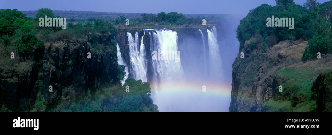 RAINBOW IN MIST MAIN WATERFALLS VICTORIA FALLS ZIMBABWE Stock Photo - Alamy