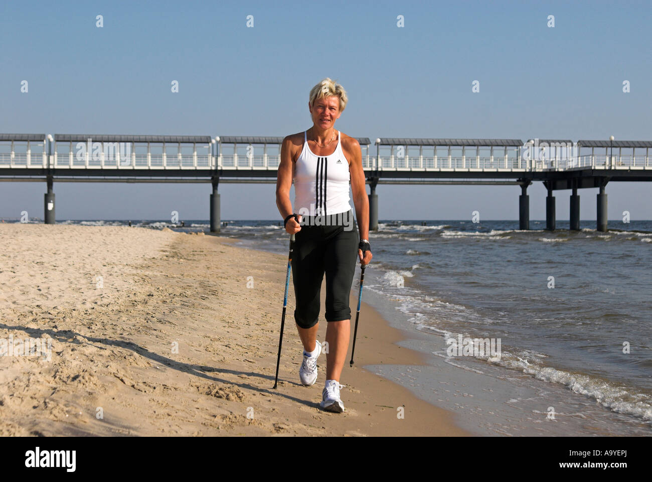 Personal trainer Sabine John at the beach of Heringsdorf, Usedom island ...