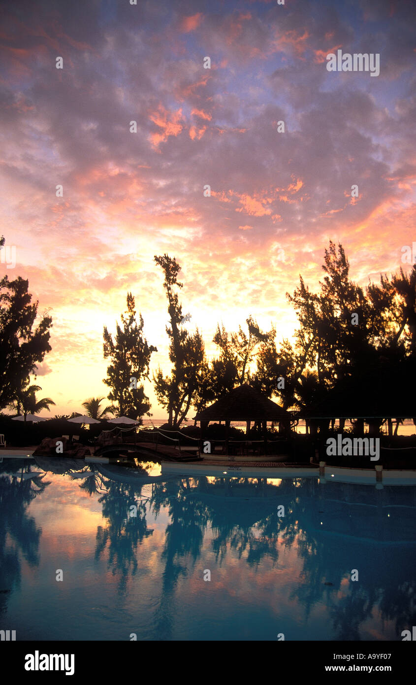 Hotel Swimming Pool in Sunset Stock Photo - Alamy