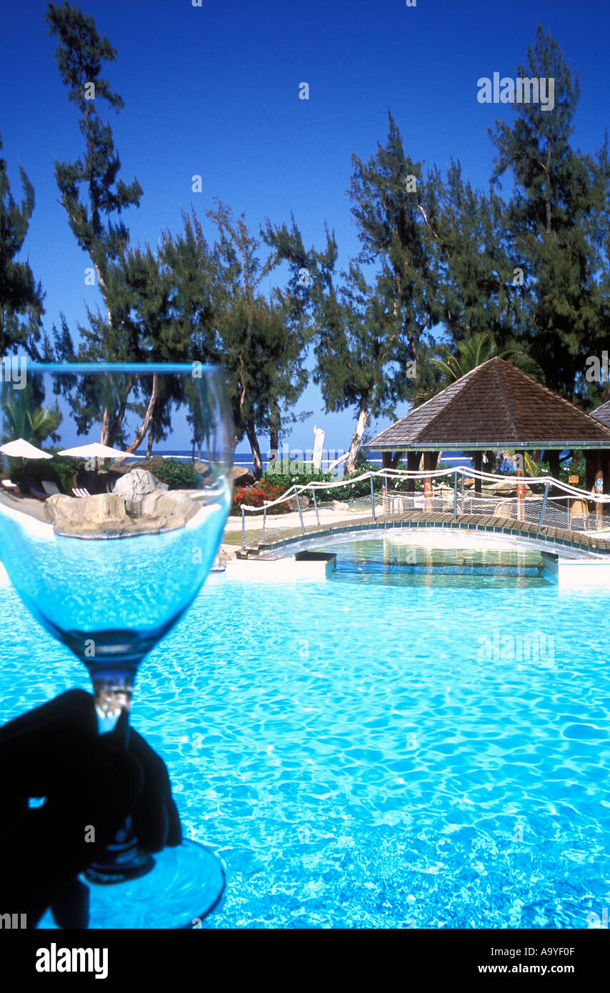Glass with Swimming Pool behind Stock Photo - Alamy