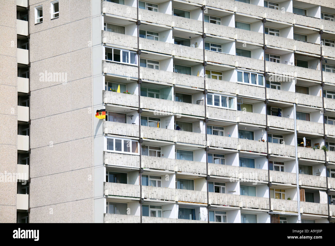 Apartment building with German flag Stock Photo - Alamy