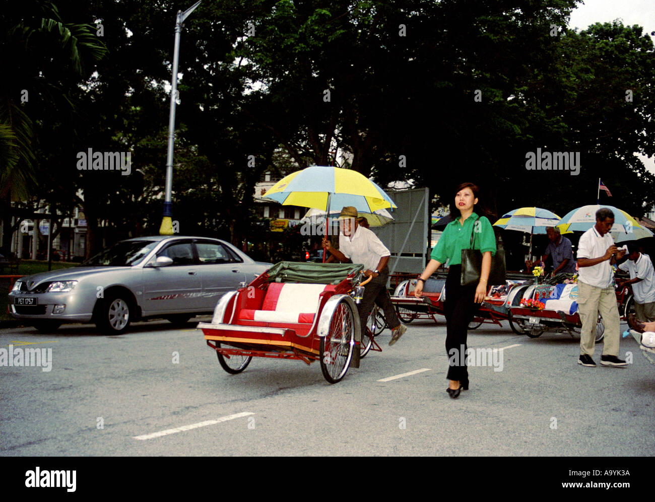 AUSTRALIAN TOURISTS ENJOYING A TRISHAW RIDE GEORGETOWN PENANG MALAYSIA ...