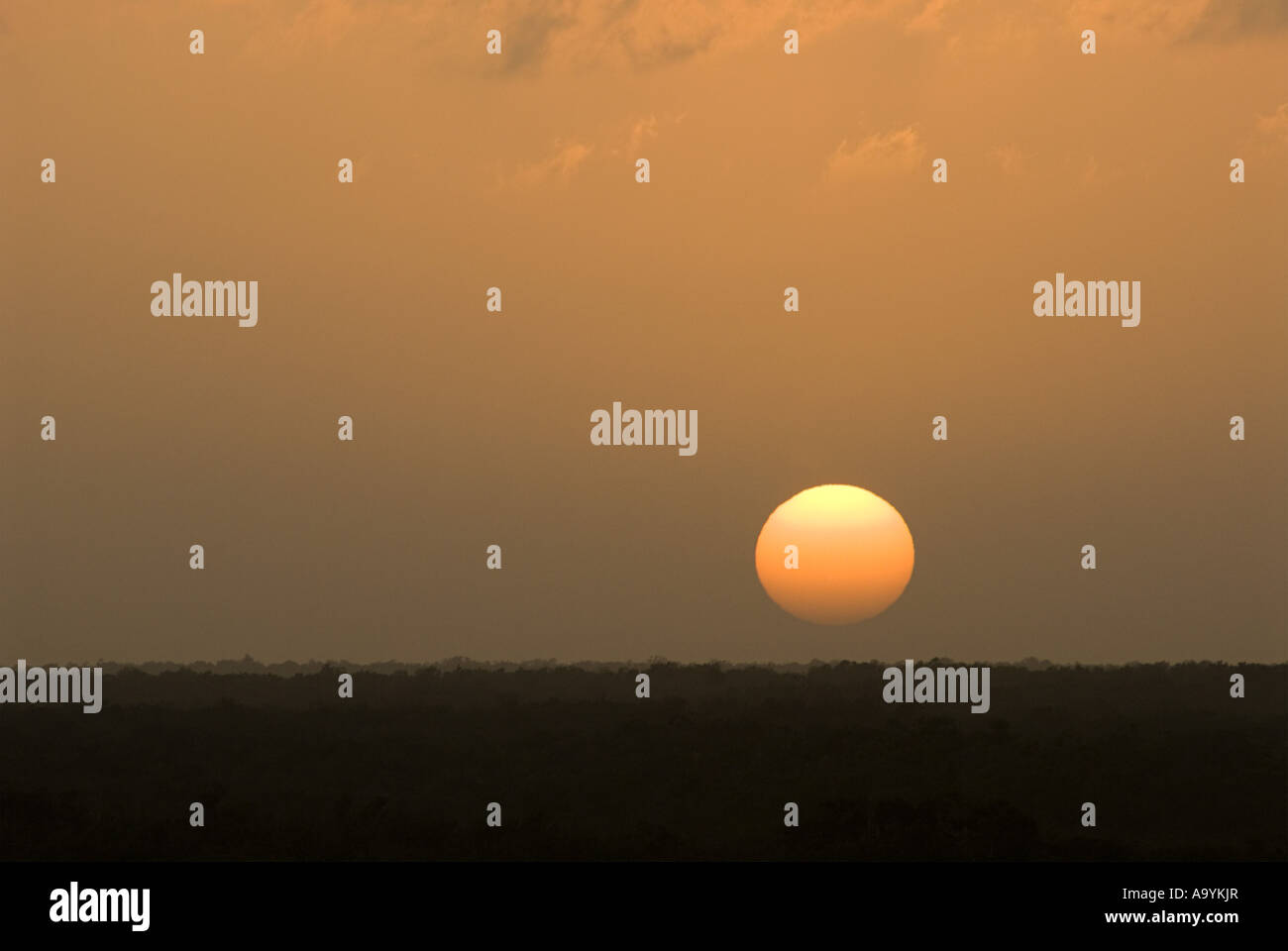 The sun setting Stock Photo - Alamy