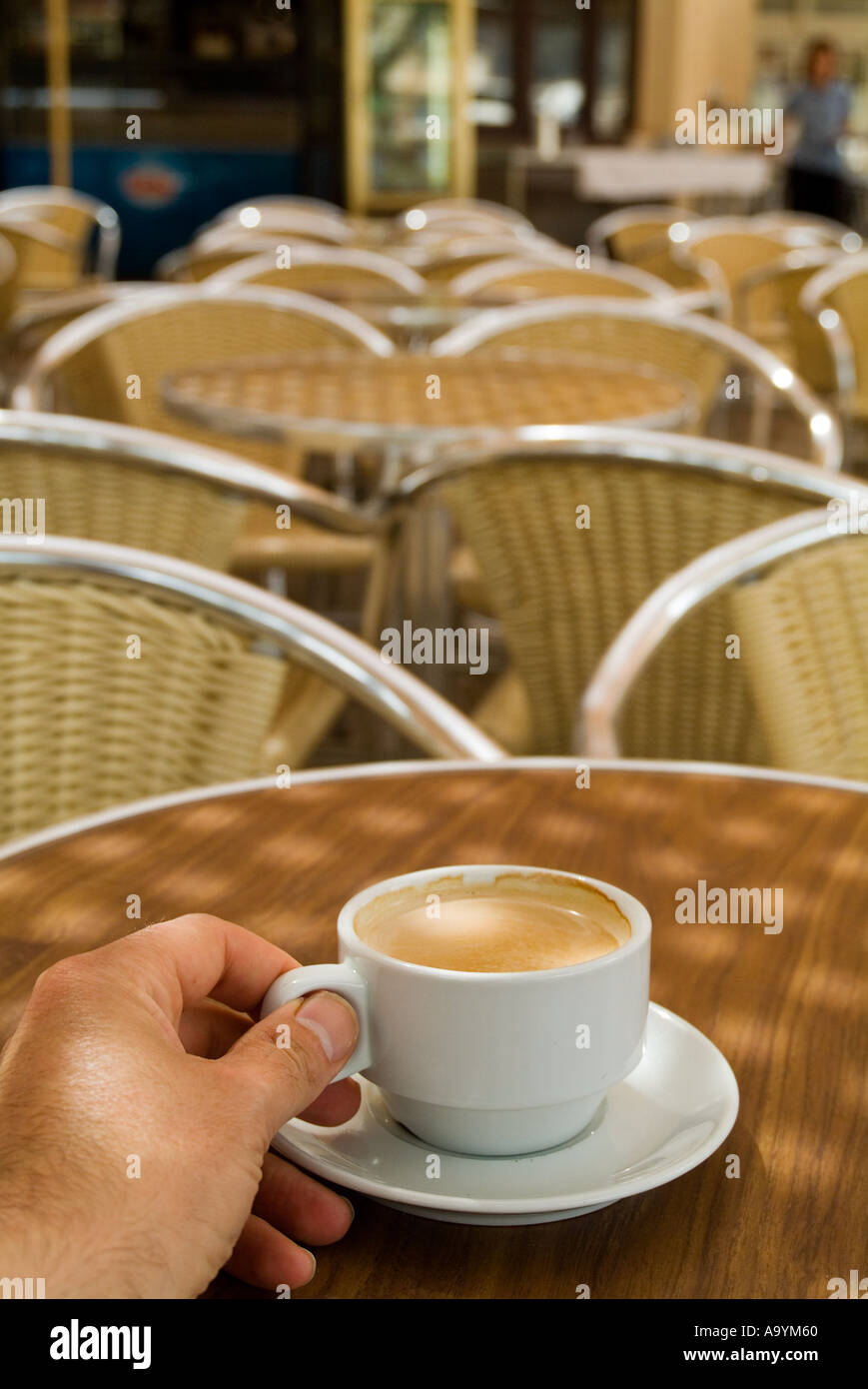 hand of man holding coffee cup in cafe Stock Photo - Alamy