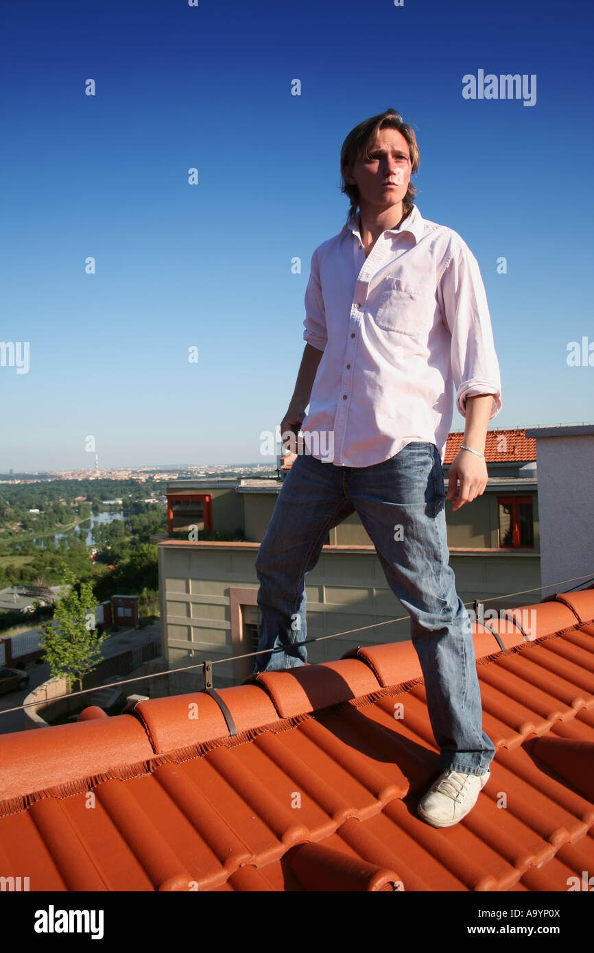 Man Standing Edge Roof High Resolution Stock Photography and Images - Alamy