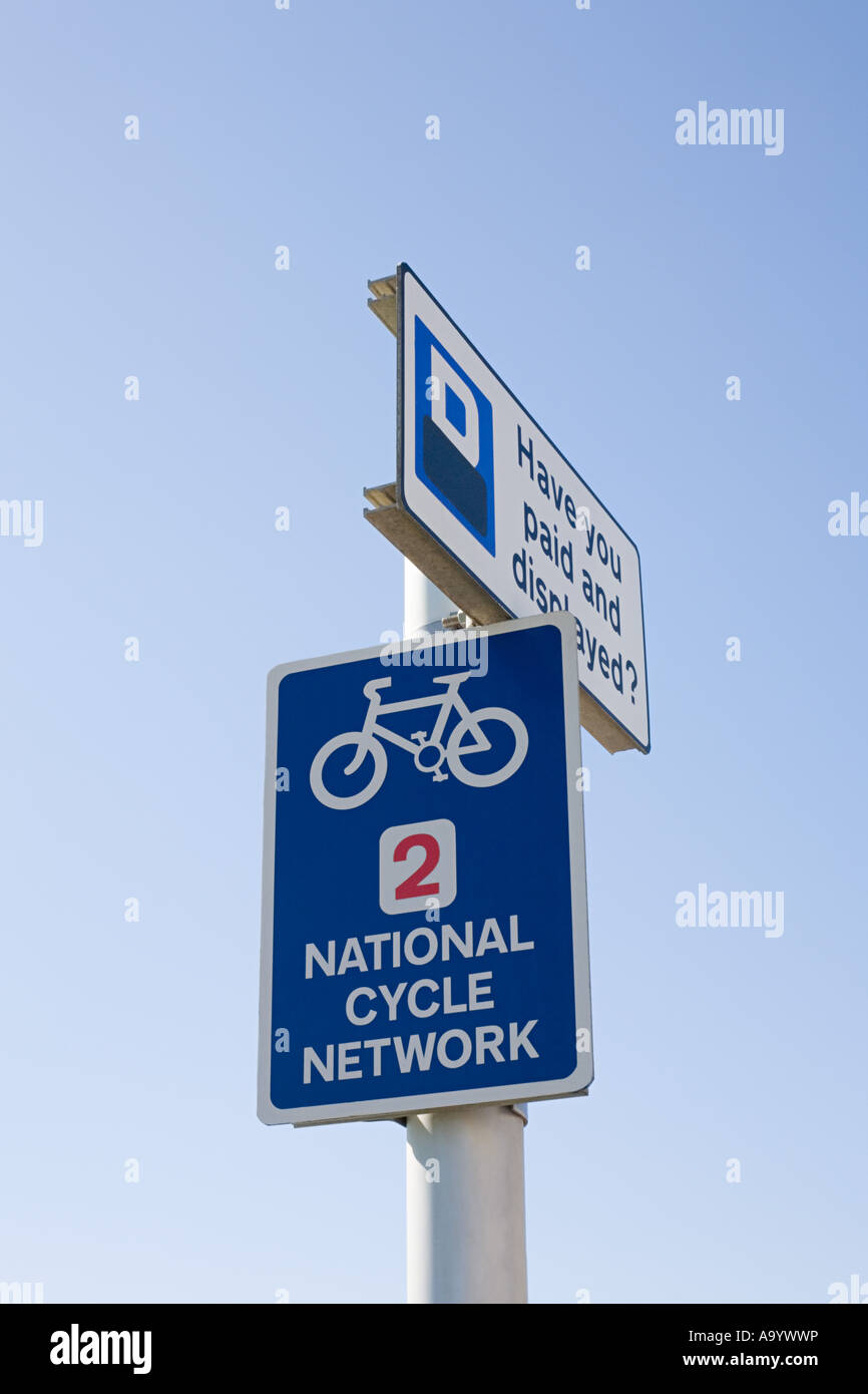 Signs against clear sky Stock Photo - Alamy