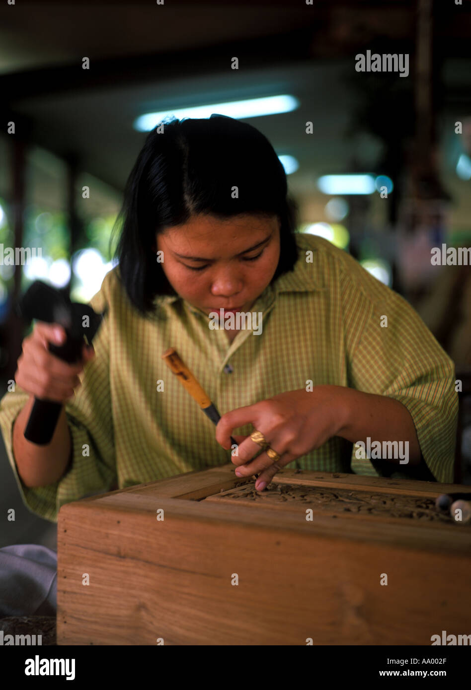 Thai woman making teak furniture Stock Photo - Alamy