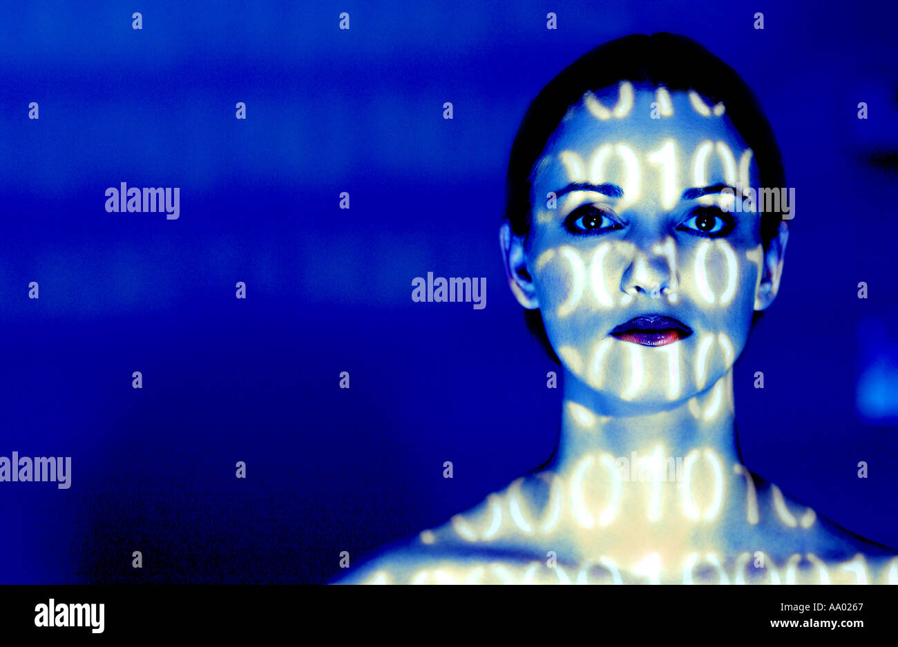 Horizontal color image of an adult female with binary code projected ...