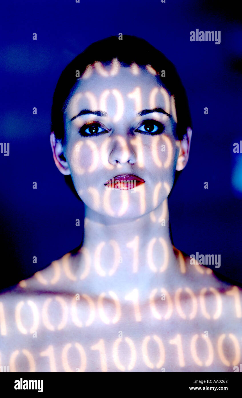 Vertical color image of an adult female with binary code projected onto ...