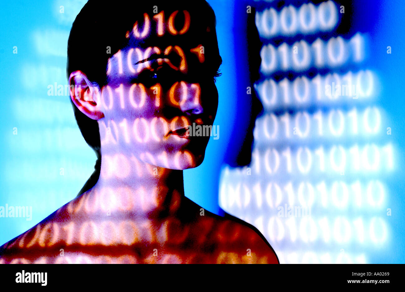 Horizontal color image of an adult female with binary code projected ...
