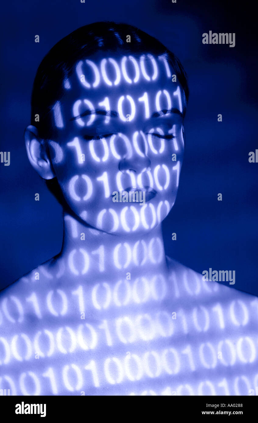 Vertical color image of an adult female with binary code projected onto her face Stock Photo - Alamy