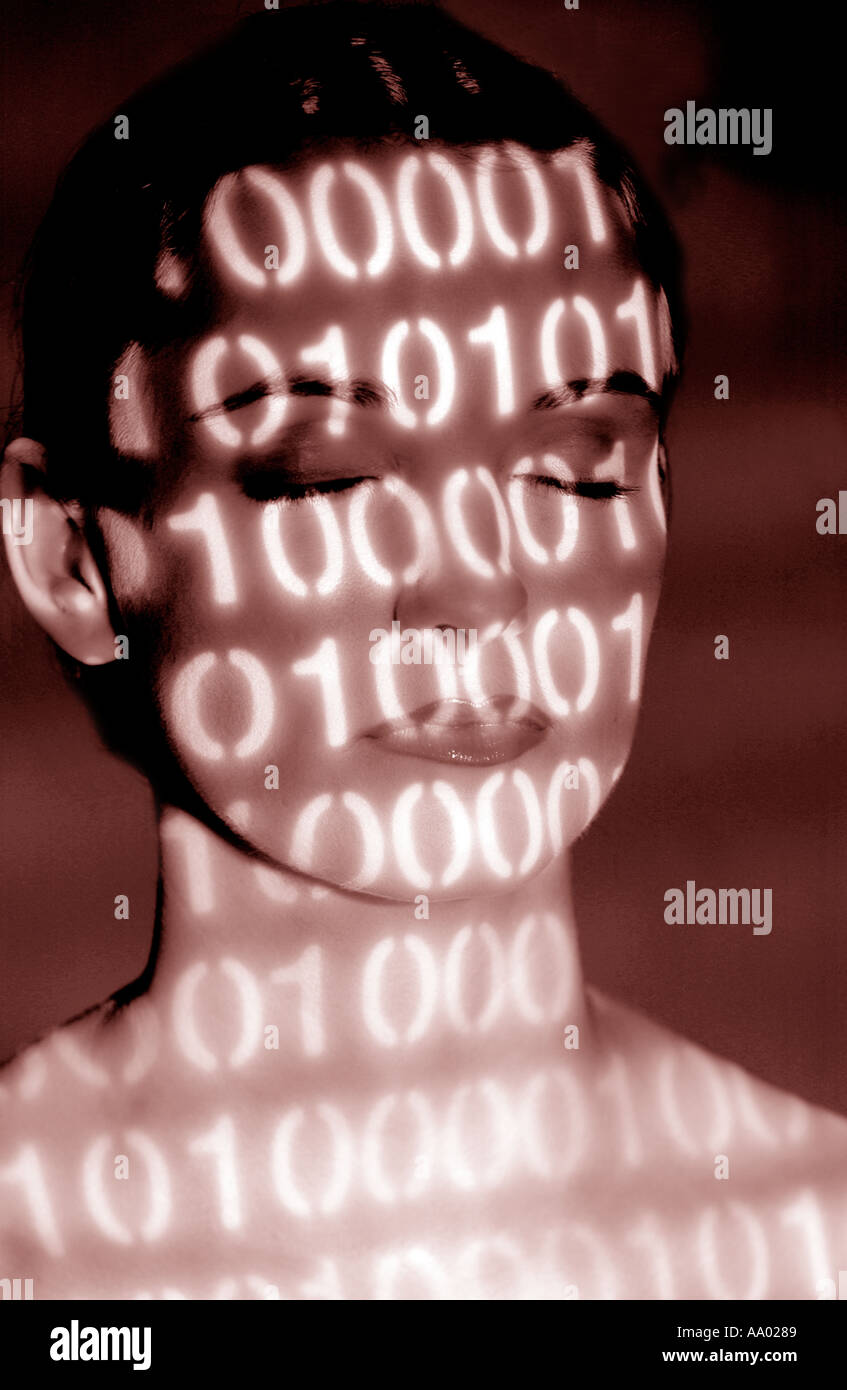 Vertical color image of an adult female with binary code projected onto her face Stock Photo - Alamy