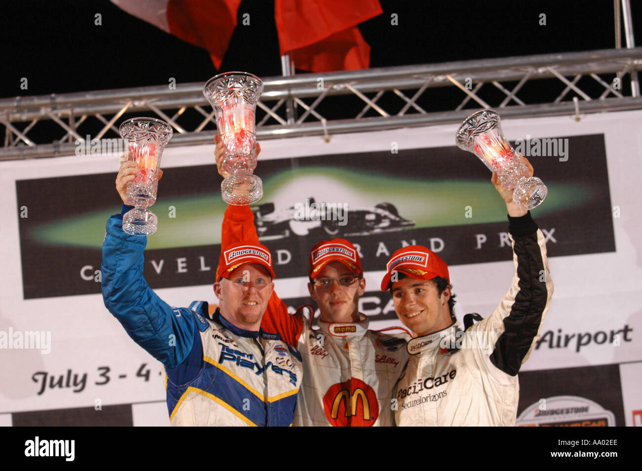 Victory podium at Cleveland Grand Prix second place Paul Tracy first ...