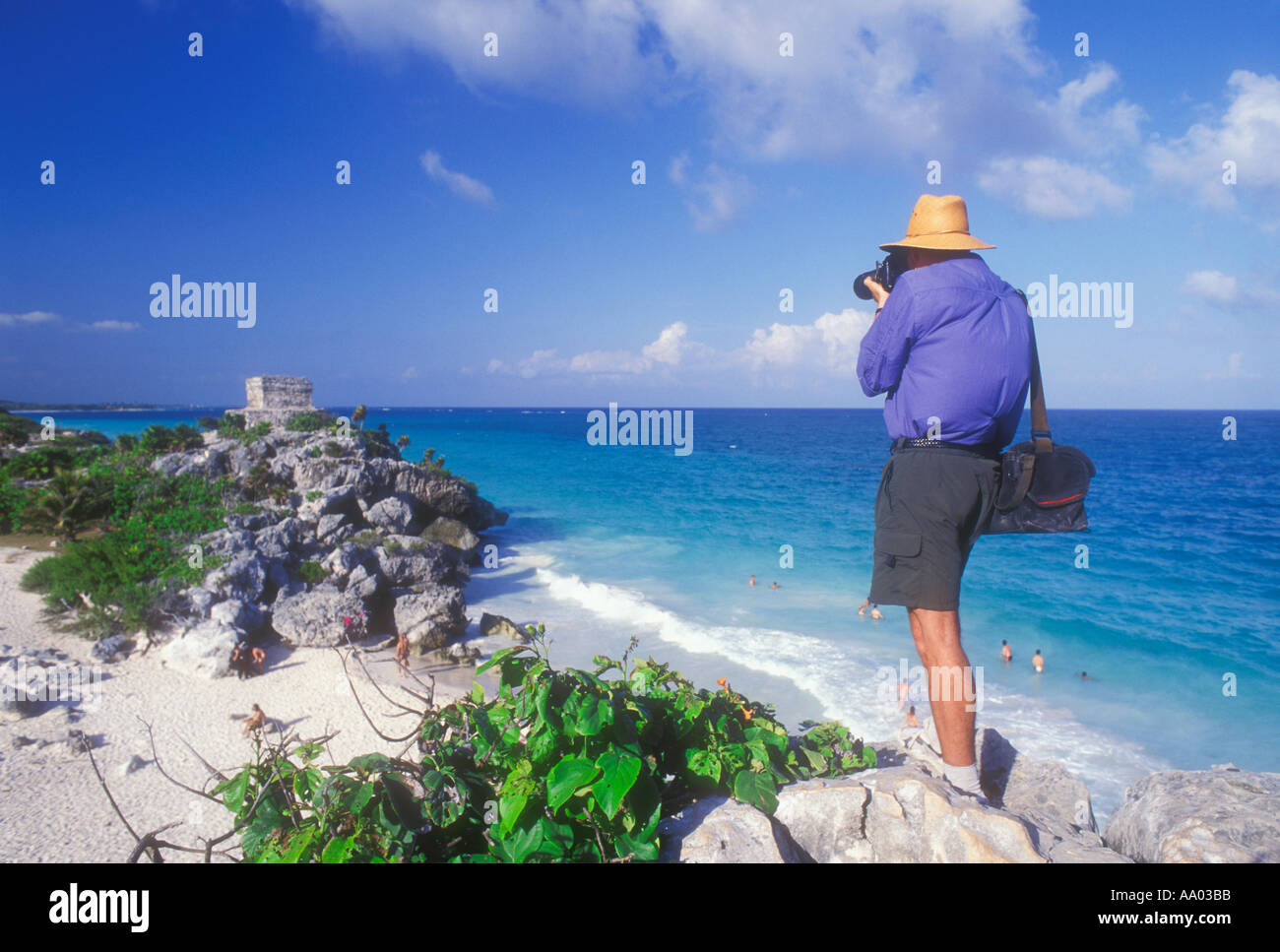 Man taking photos of the Mayan ruins at Tulum Quintana Roo Mexico Model ...
