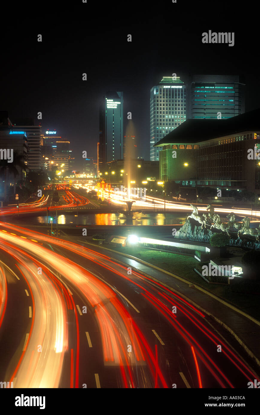 Evening traffic along Jalan Thamrin in downtown Jakarta Jakarta Java ...