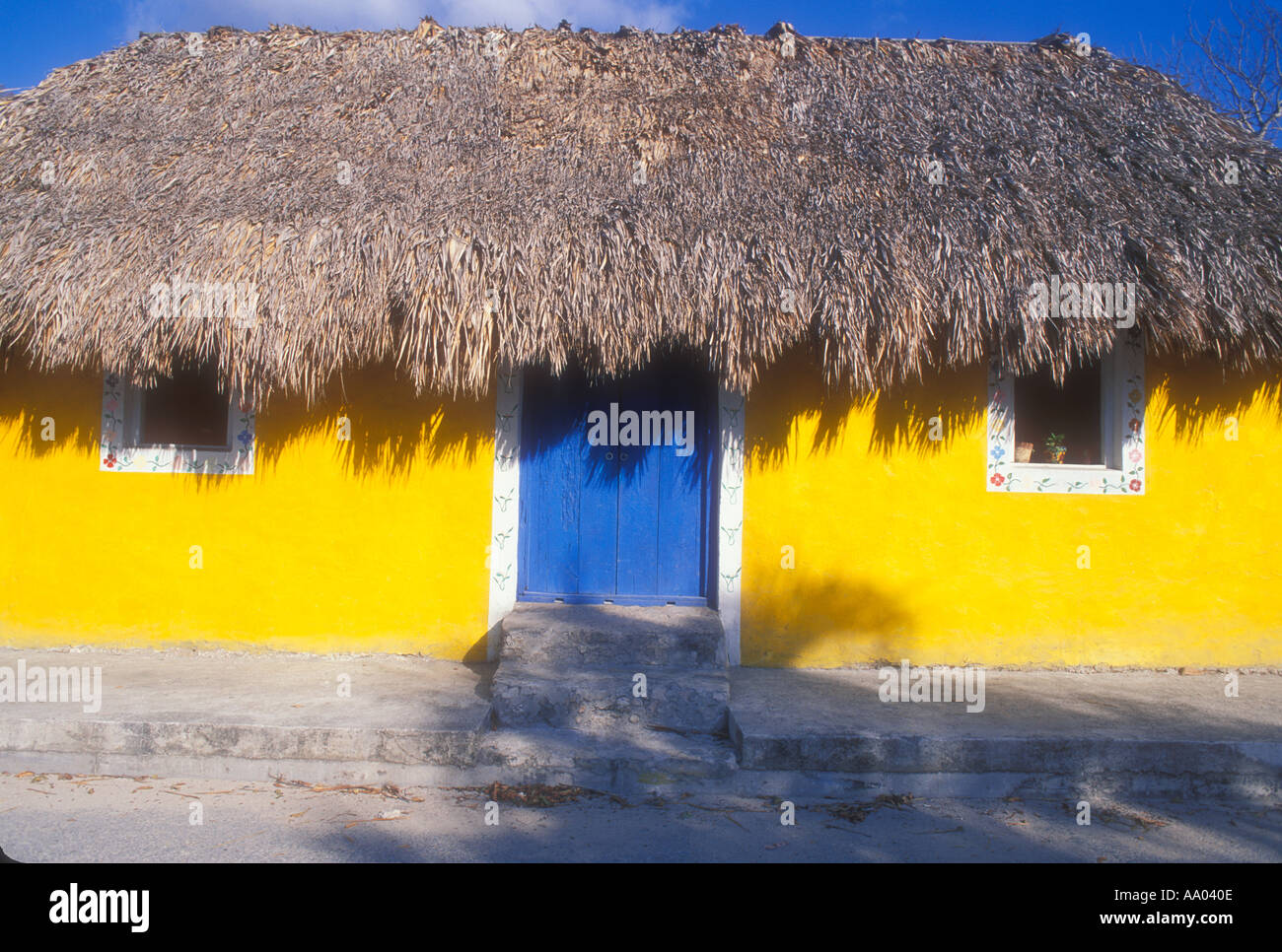 Colorful caribbean building thatched roof hi-res stock photography and ...