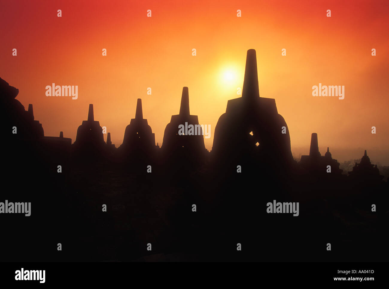 Sunrise at the Borobudur Buddhist temple complex in central Java ...