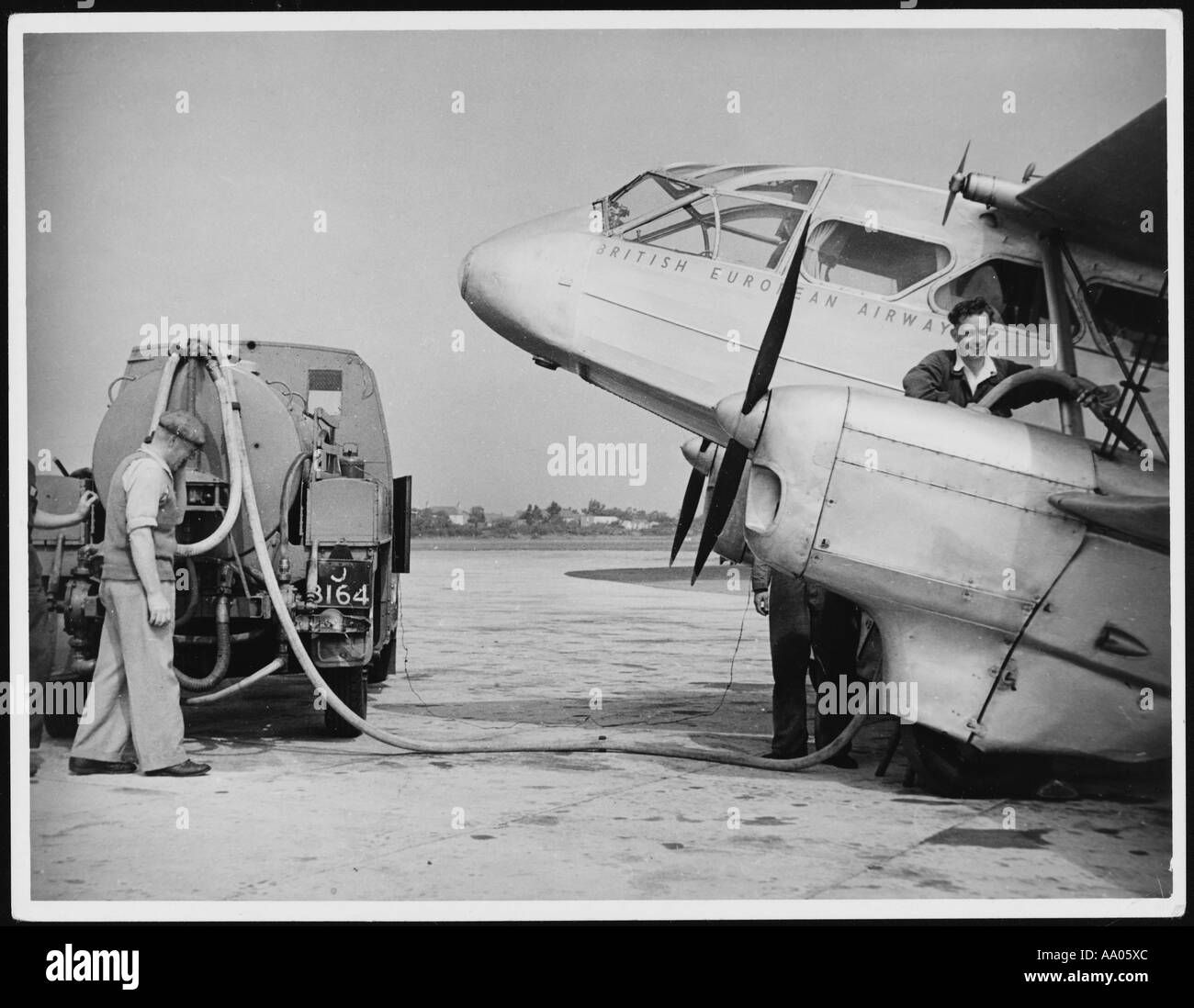 Refuelling A Plane Stock Photo - Alamy