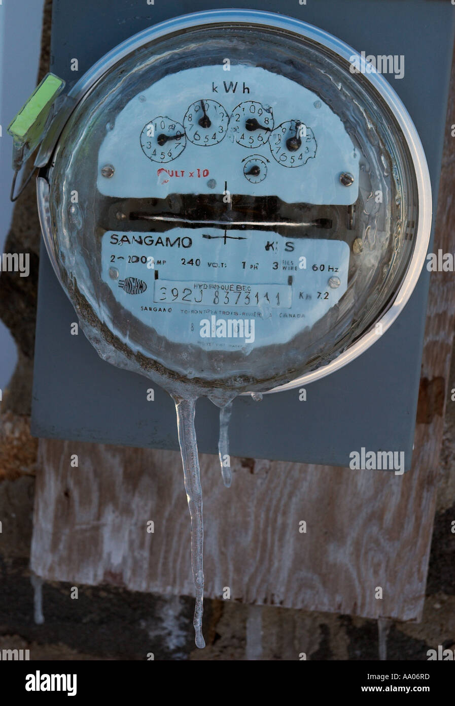 An electricity meter encased in ice in Quebec Canada Stock Photo - Alamy