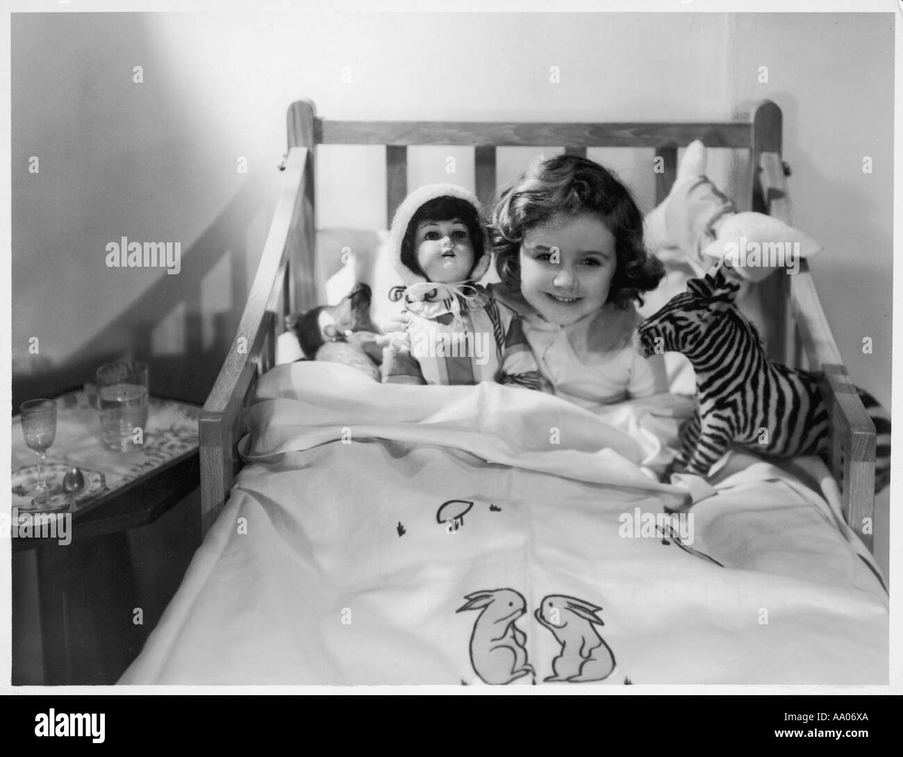 Girl In Cot Stock Photo - Alamy