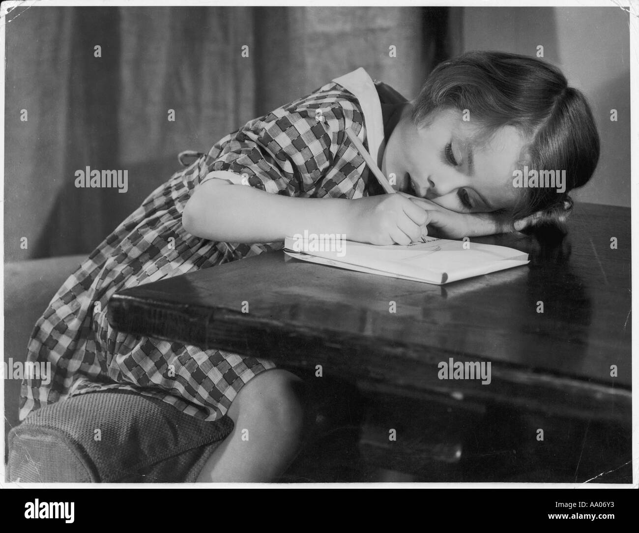 Girl writes pen Black and White Stock Photos & Images - Alamy