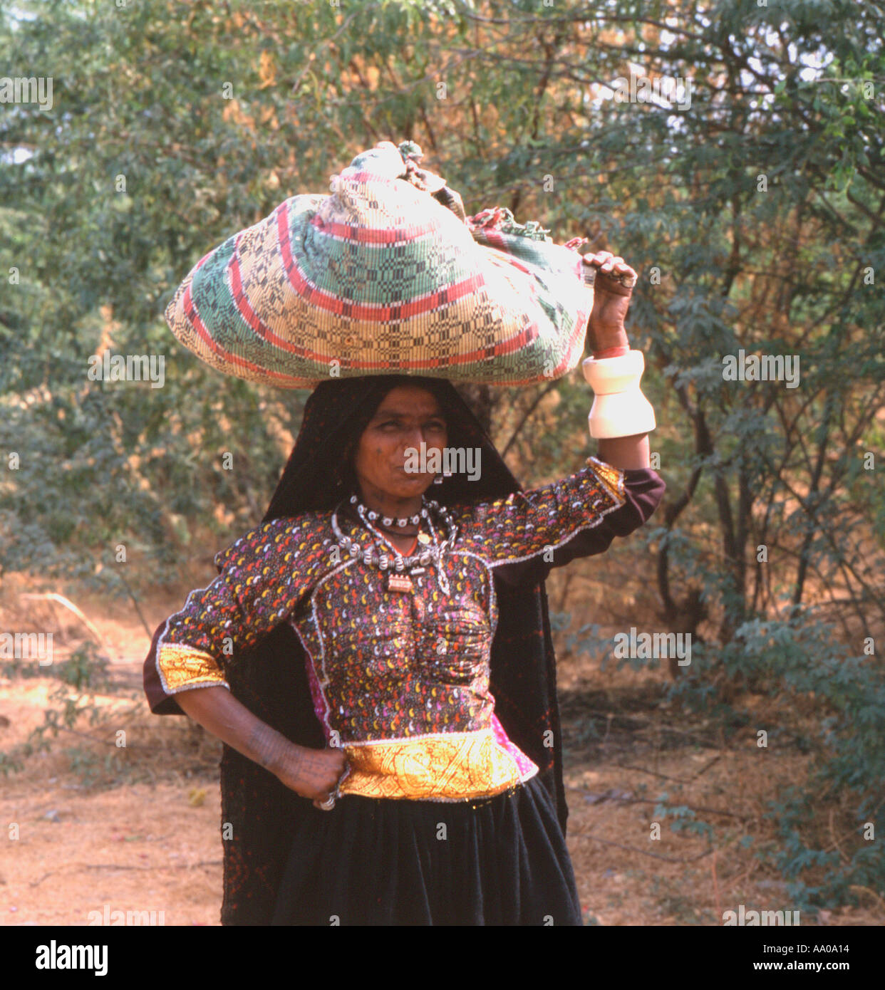 Carrying washing bundle hi-res stock photography and images - Alamy