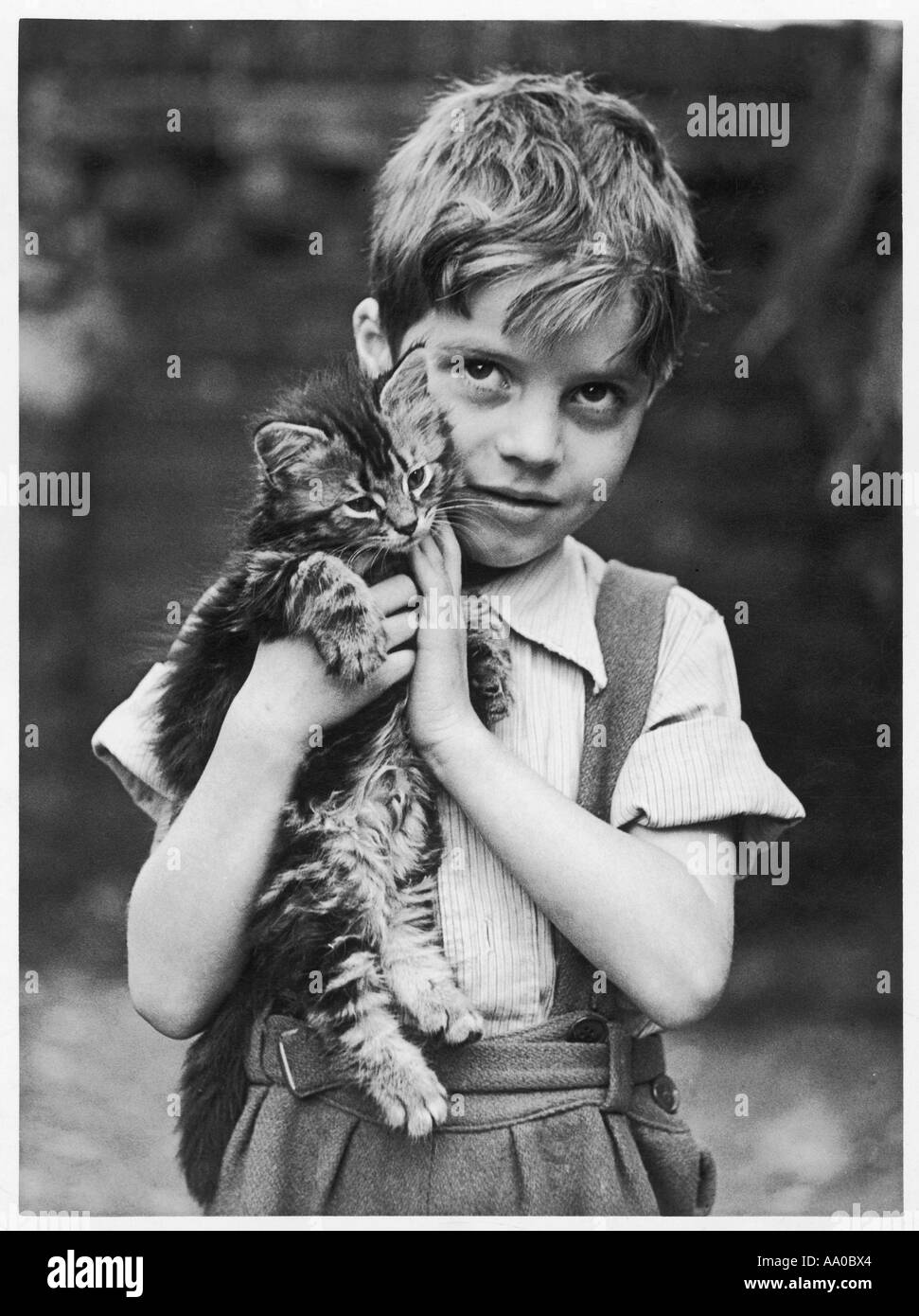 Holding cats Black and White Stock Photos & Images - Alamy