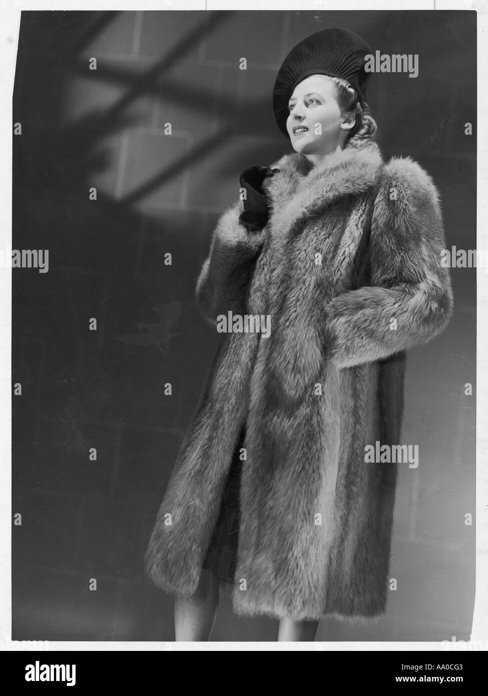 Three quarter coat Black and White Stock Photos & Images - Alamy
