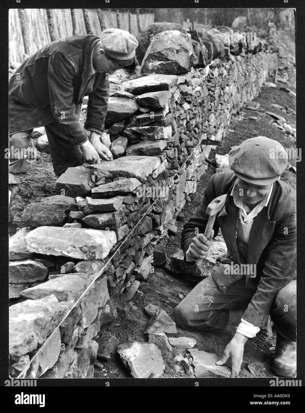 Hammer in wall Black and White Stock Photos & Images - Alamy