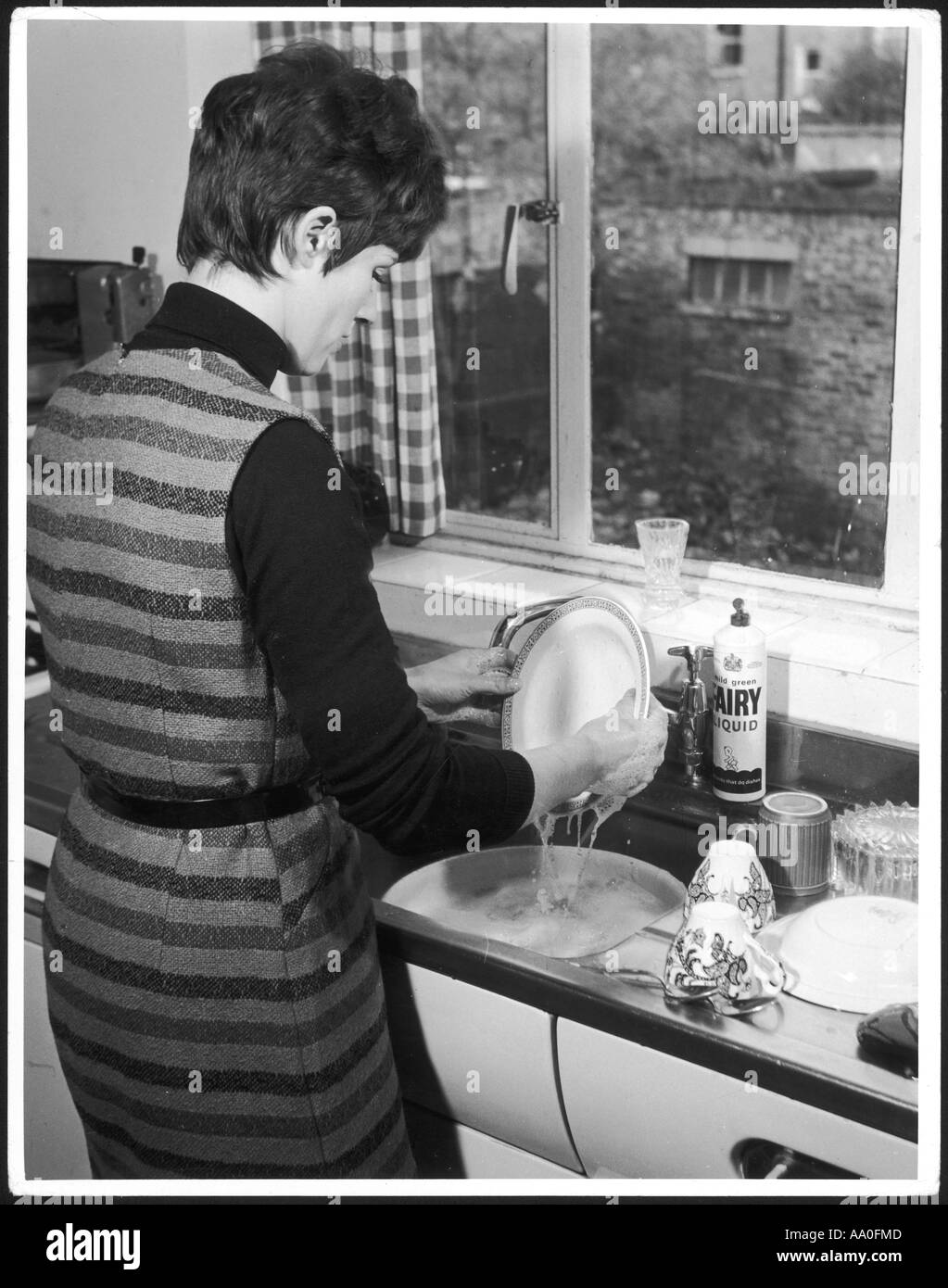 Kitchen washing up Black and White Stock Photos & Images - Alamy