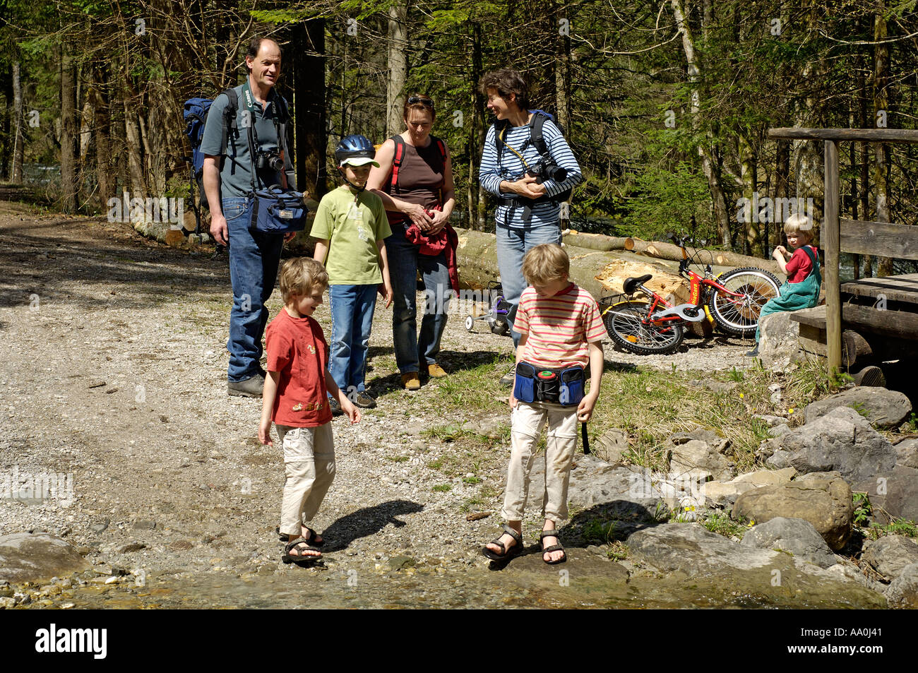 Family with children on an excursion in the nature Stock Photo - Alamy