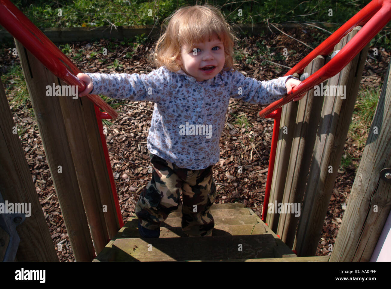 Toddler climbing steps hi-res stock photography and images - Alamy