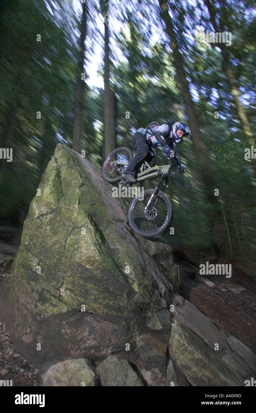 Mountain Biker riding down a rock slab on the North Shore Vancouver ...