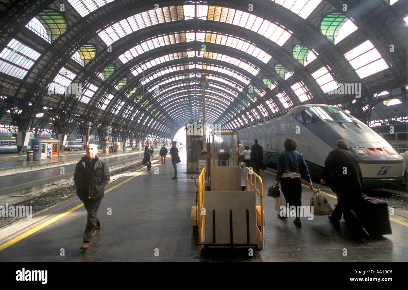 Passengers and train at Milan Central Railway Station Milan Italy Stock ...