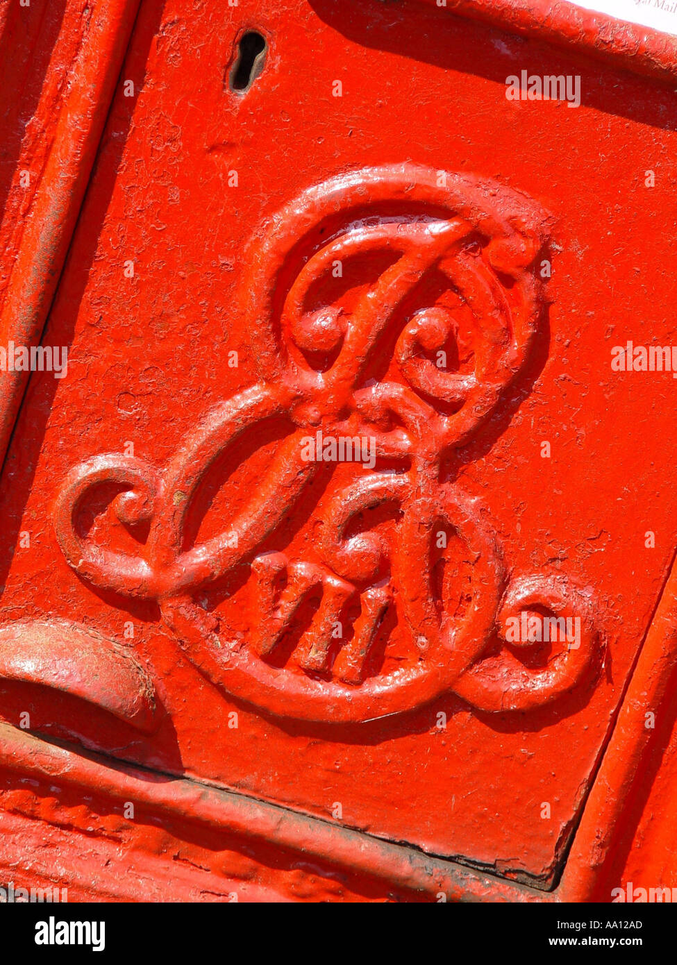 Red post box with the initials of the British Monarchy on in the ...