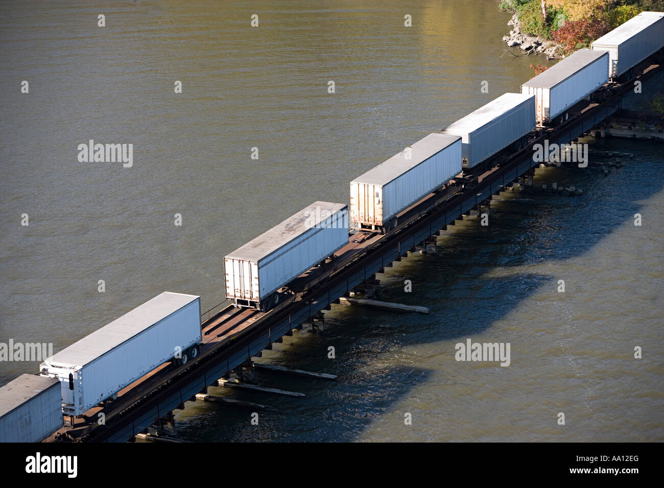 Truck trailers on a cargo container Stock Photo - Alamy