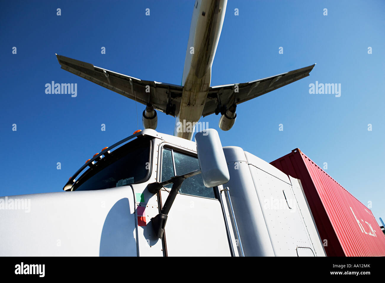 Truck and a plane Stock Photo - Alamy