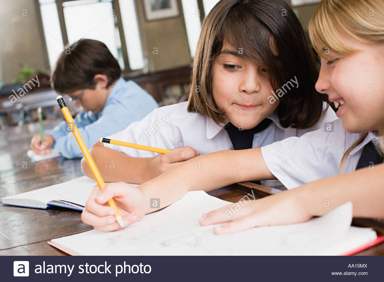 Child Copying In School Stock Photos & Child Copying In School Stock ...