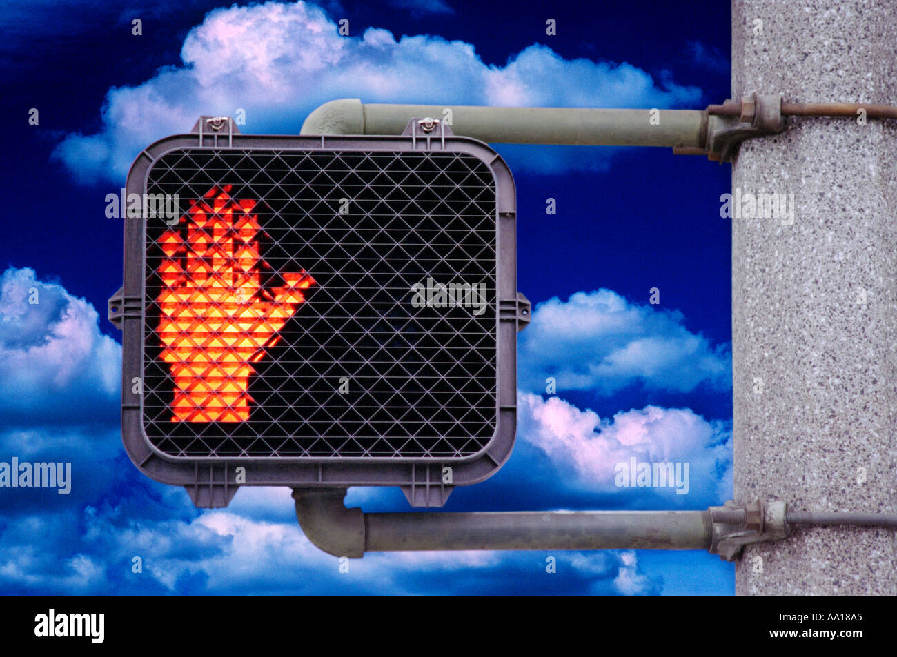 Traffic signal at crosswalk displaying the Don t Walk icon against a ... Traffic signal at crosswalk displaying the Don t Walk icon against a ...
