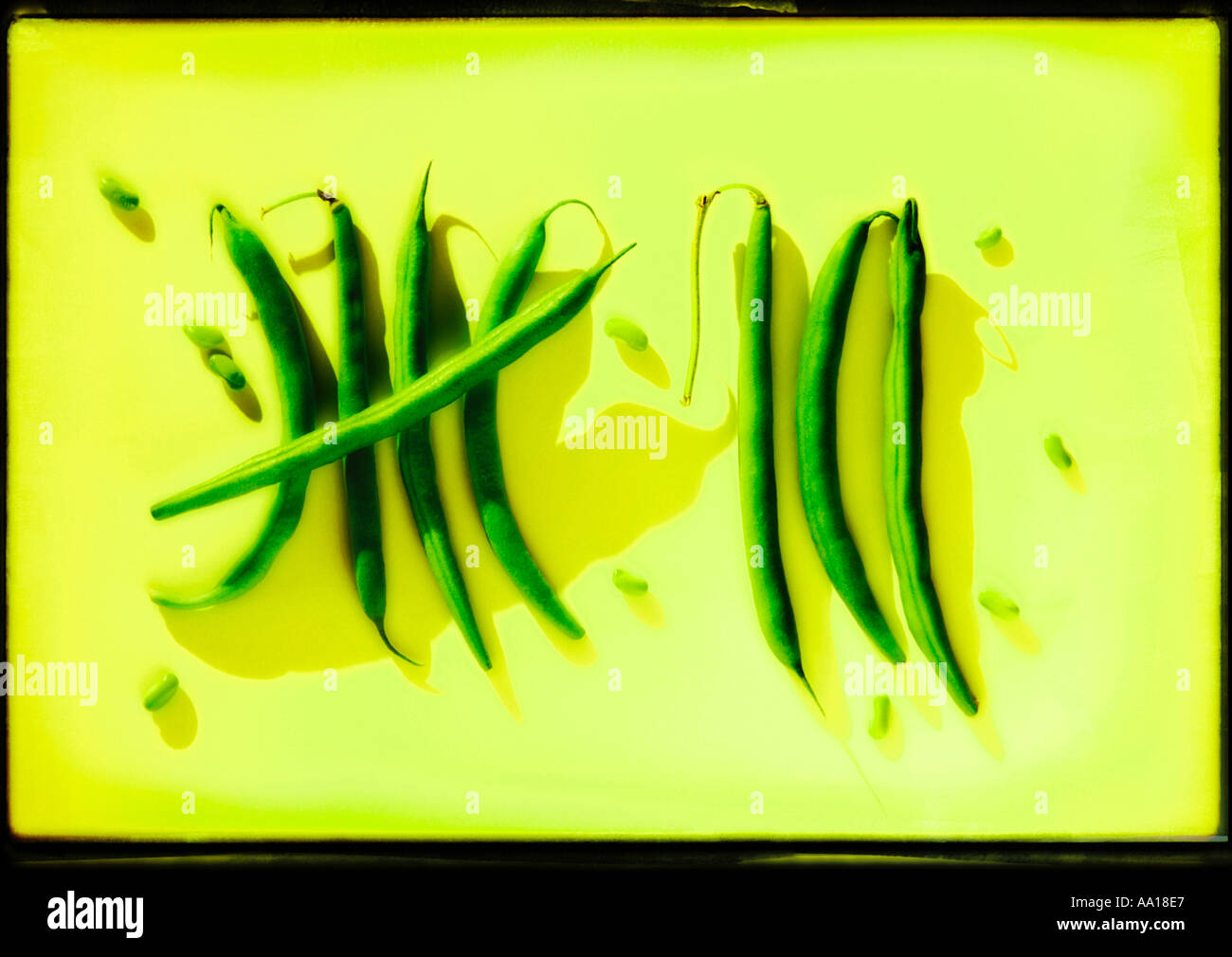 Green beans forming hash marks for counting Stock Photo - Alamy