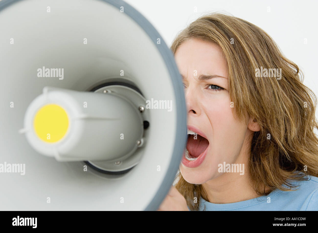 Woman using loudspeaker Stock Photo - Alamy