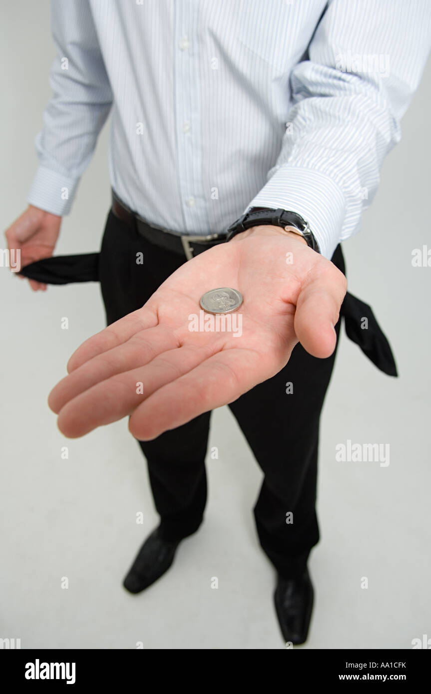 Coin in palm hi-res stock photography and images - Alamy