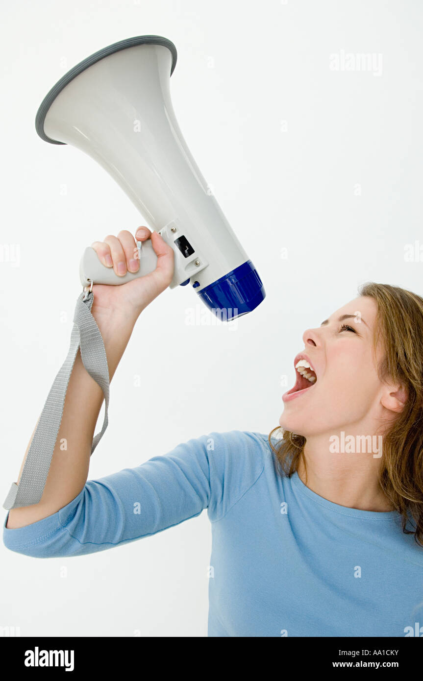 Woman holding loudspeaker hi-res stock photography and images - Alamy