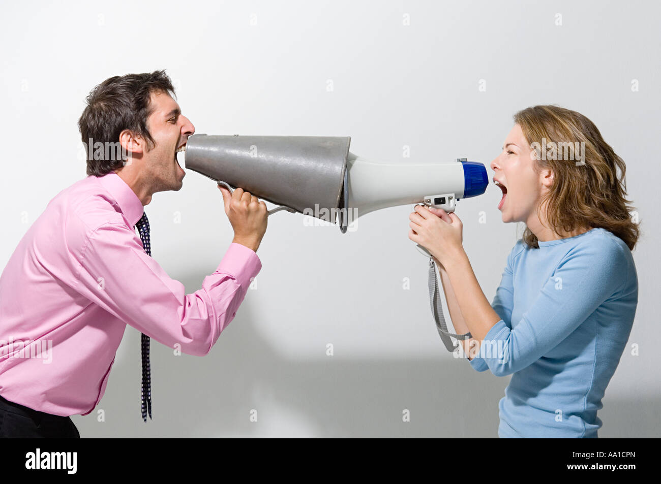 Colleagues shouting at each other Stock Photo - Alamy